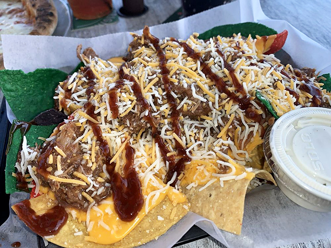 These pulled pork nachos aren't messing around&mdash;they're the kind of serious comfort food that makes you consider canceling your afternoon plans for a nap.