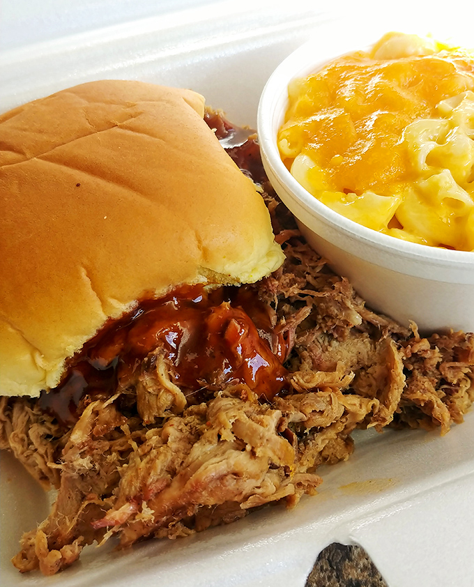 The pulled pork sandwich with mac and cheese might require both hands and several napkins, but some messes are absolutely worth making.