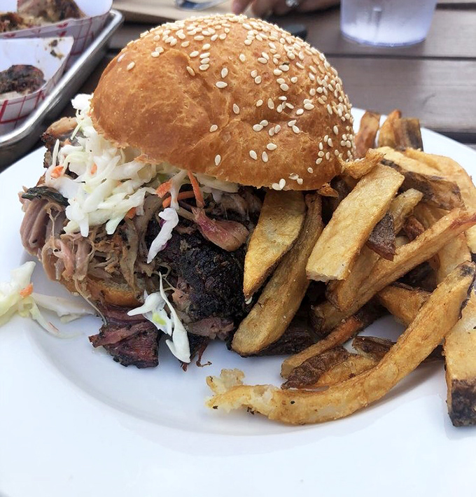 This isn't just a sandwich&mdash;it's an architectural marvel of pulled pork, slaw, and golden fries that makes skyscrapers jealous.