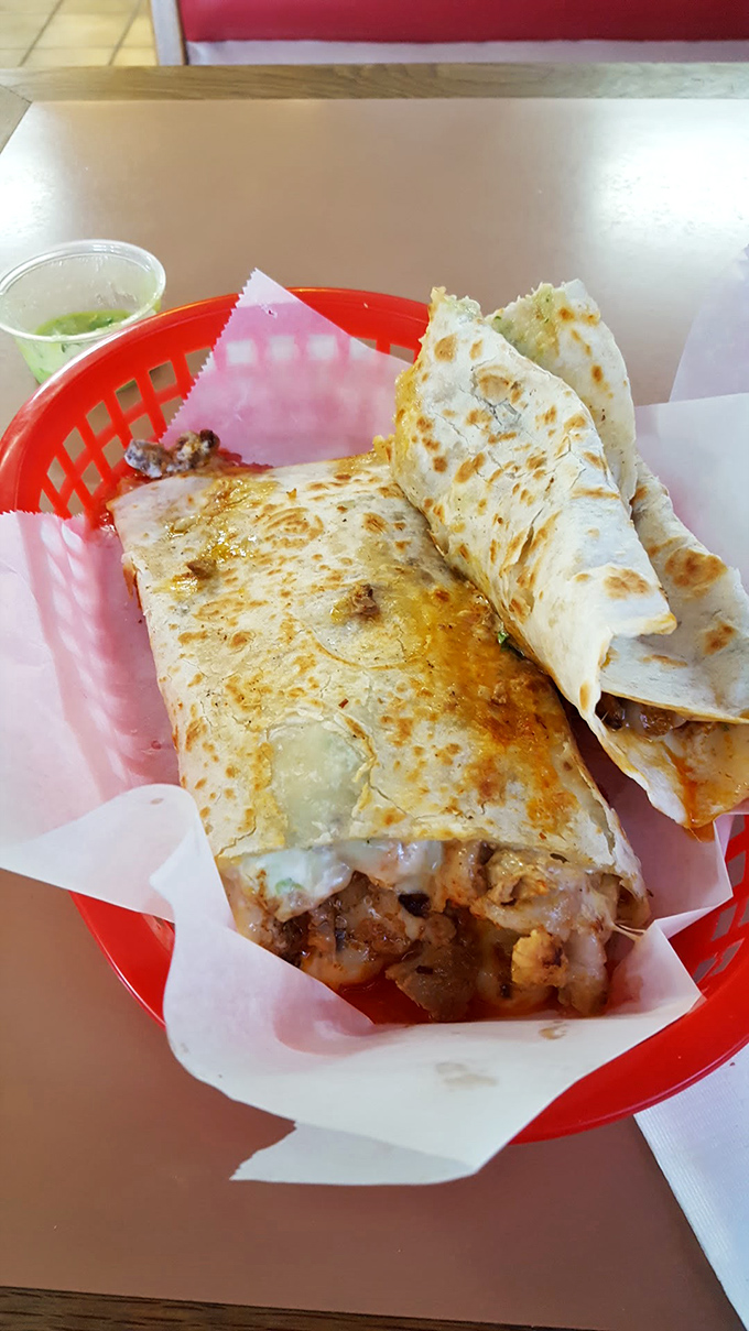 Behold the quesadilla that launched a thousand road trips. That golden-brown tortilla and melty cheese combo is the stuff of dreams.