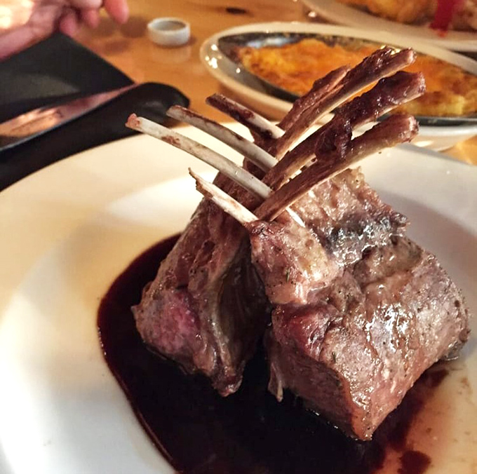 The rack of lamb stands at attention like a delicious honor guard, ready to serve your taste buds with distinction.