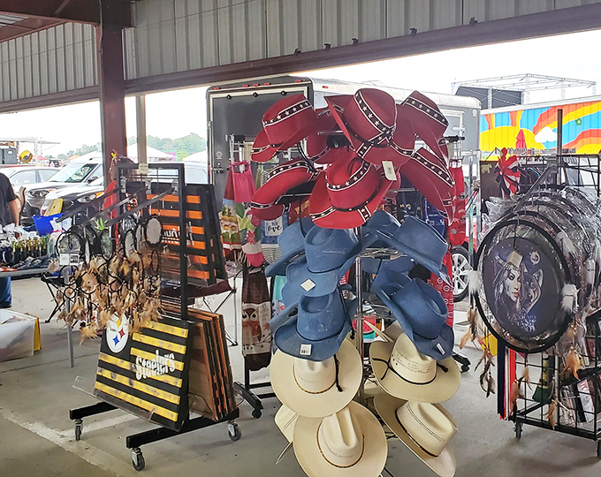The hat rack hierarchy: cowboy hats stacked like a Texas skyscraper. Perfect for those who arrive bare-headed but refuse to leave without making a statement.