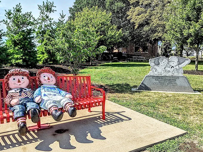 Raggedy Ann and Andy, taking a well-deserved break on their bench. These iconic dolls have roots in Illinois, and Arcola celebrates them with delightful whimsy.