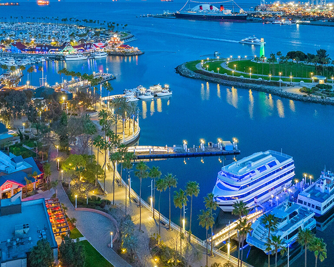 Rainbow Harbor lives up to its name, where palm-lined promenades and gleaming yachts create a playground for both sailors and landlubbers alike.