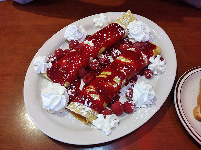 Dessert blintzes that would make your grandmother weep with joy &ndash; these raspberry-crowned beauties balance sweet, tart, and creamy in perfect harmony.