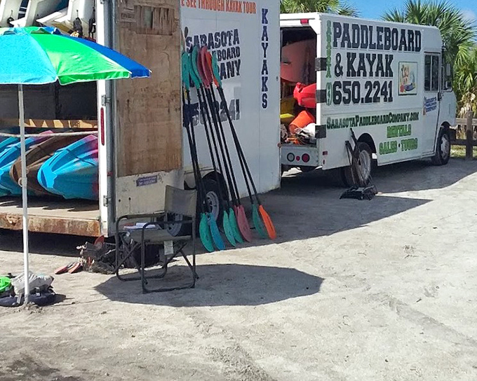 The rental station where aquatic adventures begin, organized better than most people's closets.
