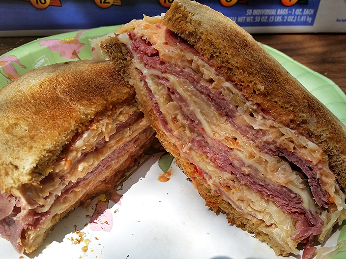 The Reuben &ndash; where corned beef, sauerkraut, and melted cheese perform a harmonious dance between two perfectly toasted slices of rye bread.