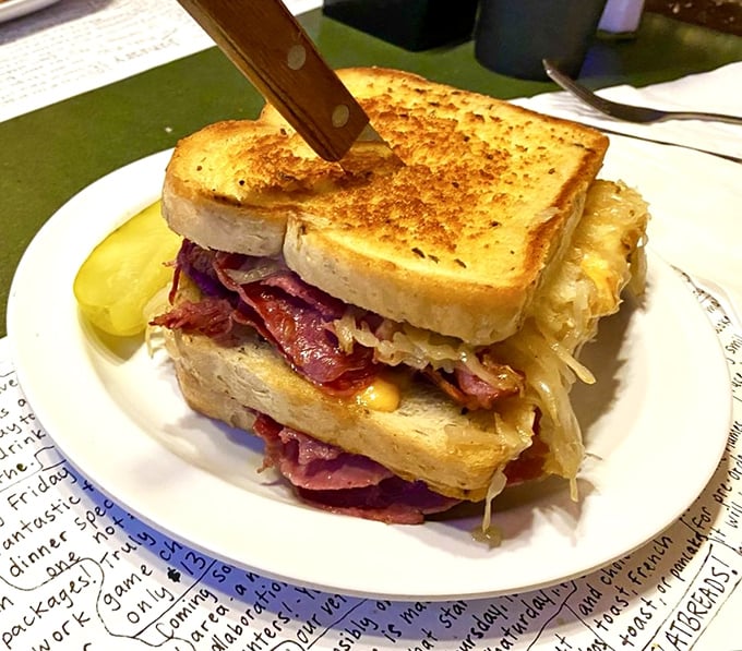 A sandwich so stuffed with personality it needs a knife to hold it together. This Reuben isn't just a meal &ndash; it's an engineering marvel.