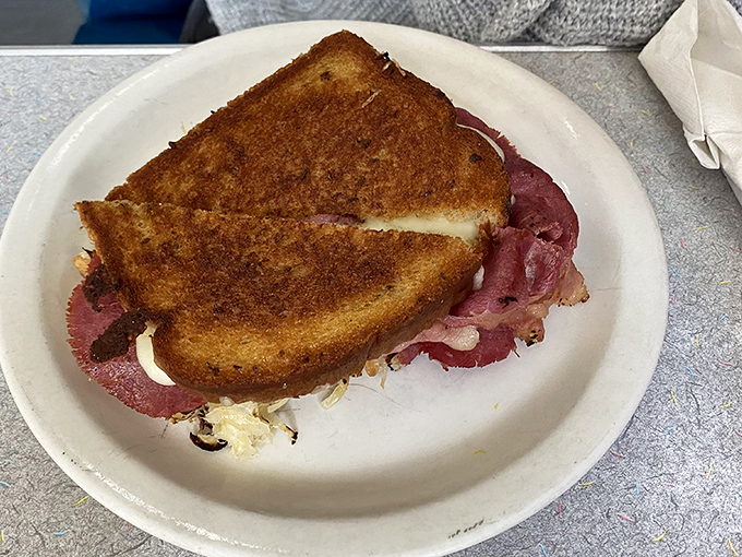 Grilled bread, melty cheese, and that distinctive pink corned beef &ndash; this Reuben isn't trying to reinvent the wheel, just perfect it.