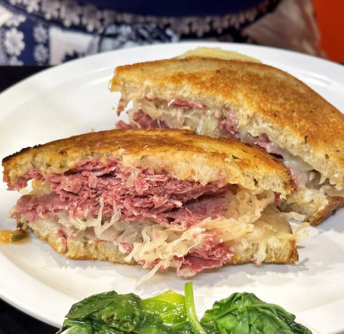 The Reuben sandwich: where corned beef, sauerkraut, and Swiss cheese come together in a harmony that would make Mozart weep with joy.