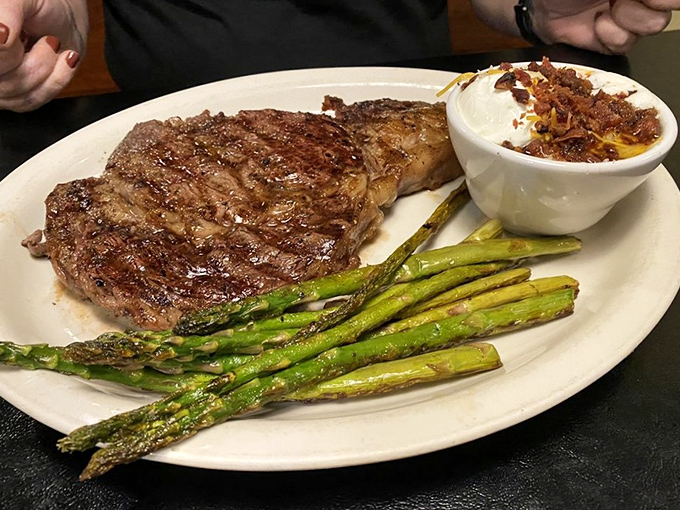 This ribeye showcases the marbling and flame-kissed perfection that built Hoof & Horn's legendary reputation.
