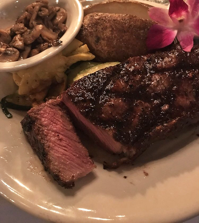 This isn't just a steak &ndash; it's a masterpiece of primal simplicity. Perfectly seared ribeye that would make even the most dedicated vegetarian question their life choices.