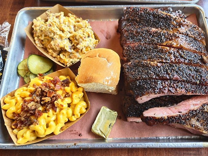 BBQ platter nirvana! That bark on those ribs deserves its own zip code, while the mac and cheese stands by like a loyal sidekick.