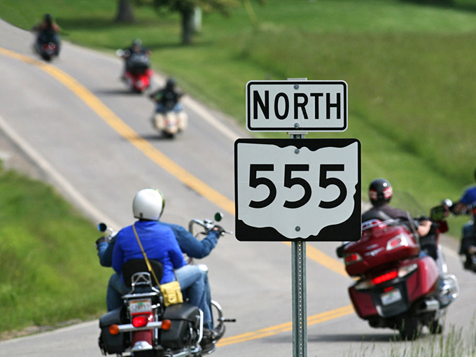 Motorcycle enthusiasts have turned the Triple Nickel into their personal pilgrimage route. The biker wave is practically mandatory here.