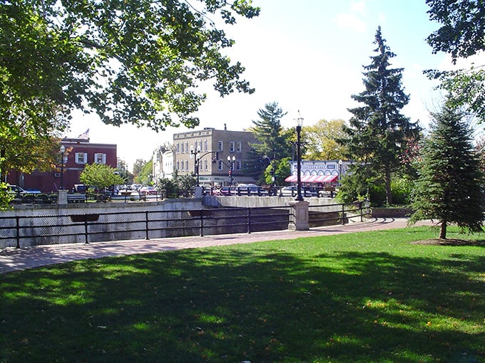 Triangle Park serves as the town's front yard, where the river and downtown buildings create a postcard-perfect scene that Instagram filters can't improve. 