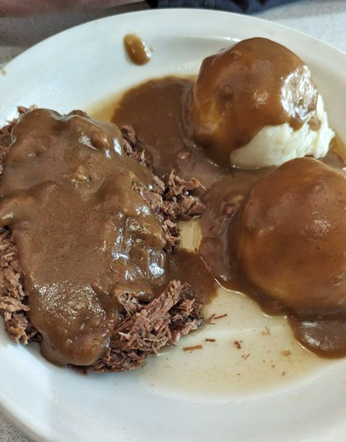 Roast beef and mashed potatoes swimming in gravy &ndash; the kind of plate that makes you want to call your cardiologist just to brag.