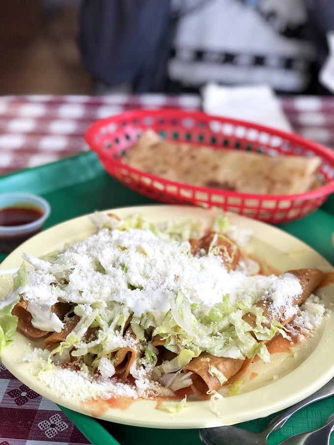 These rolled tacos aren't just topped with lettuce and cheese&mdash;they're crowned with them. Crispy, crunchy perfection that makes fast-food versions weep with inadequacy.