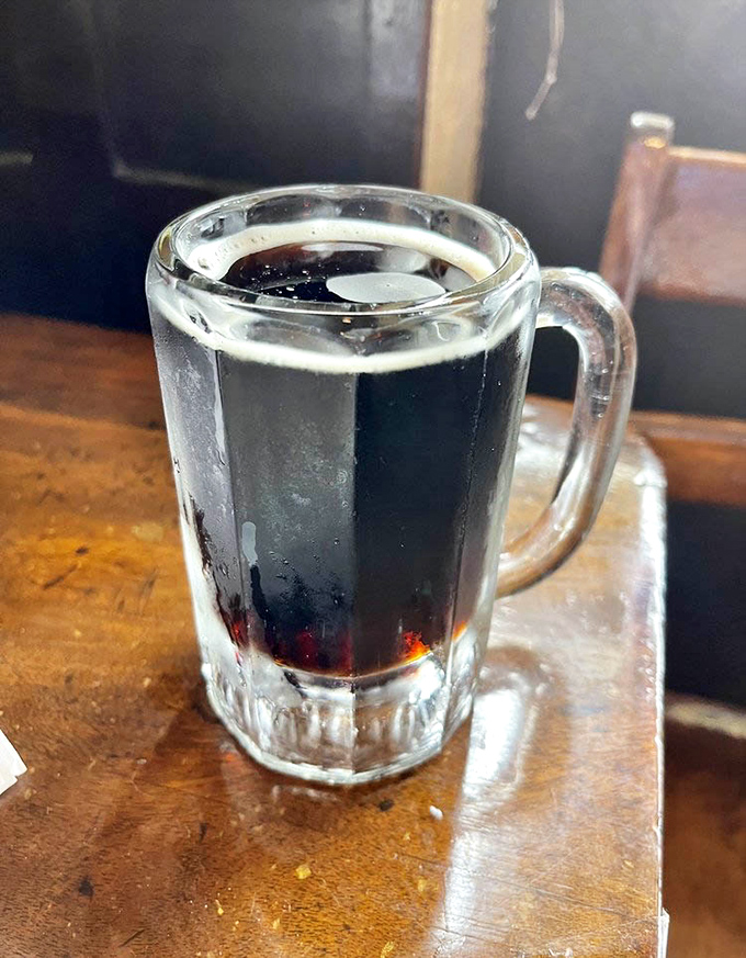 Root beer served in glass mugs because some traditions deserve proper respect.