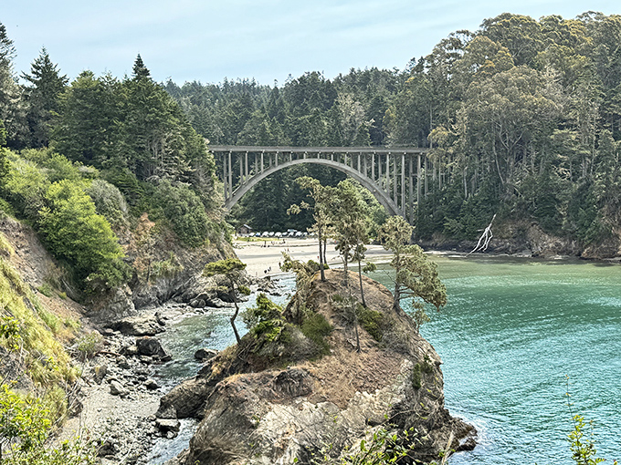Russian Gulch's bridge arches gracefully over turquoise waters, connecting not just two pieces of land, but visitors to the wild beauty of Northern California.