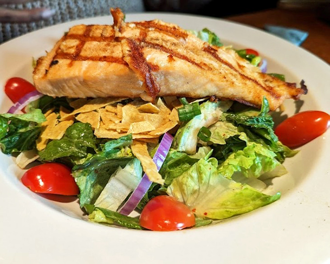 Even the salads mean business here. This grilled salmon perches atop greens like it's saying, "Yes, I'm healthy, but I'm not boring."
