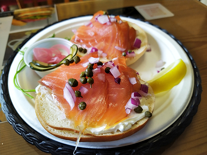 Lox on a bagel: where cream cheese becomes a throne for salmon royalty, crowned with capers and red onion jewels.