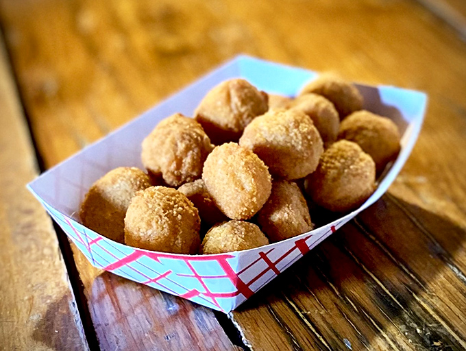 Golden sauerkraut balls arrive like little spheres of crispy happiness, proving Ohio knows its comfort food.