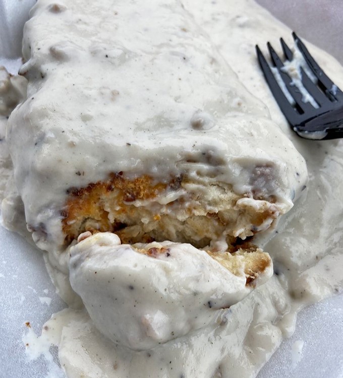 Beneath that cloud of vanilla icing lies a pastry so divine, it could make angels weep and dietitians look the other way.