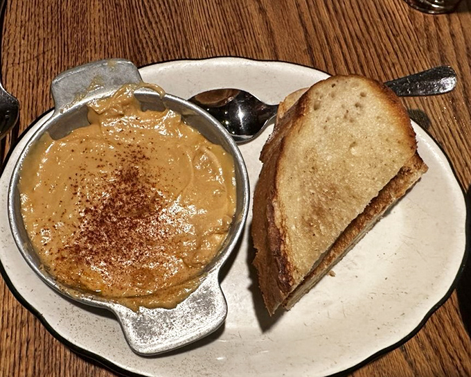The Scotch rarebit arrives bubbling and bronzed, a cheese lover's dream so rich it might make you temporarily forget about your cholesterol numbers.