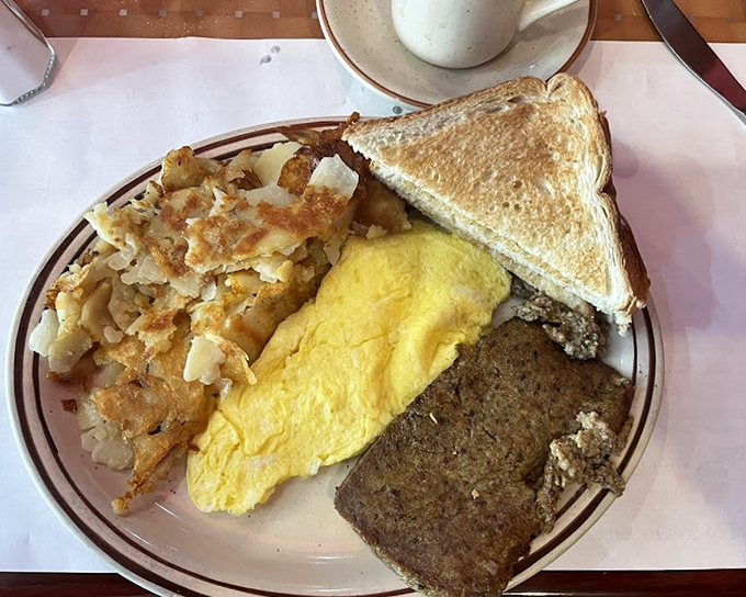 The holy trinity of diner breakfast: crispy home fries, fluffy eggs, and scrapple &ndash; Delaware's contribution to breakfast that's worth crossing state lines for.