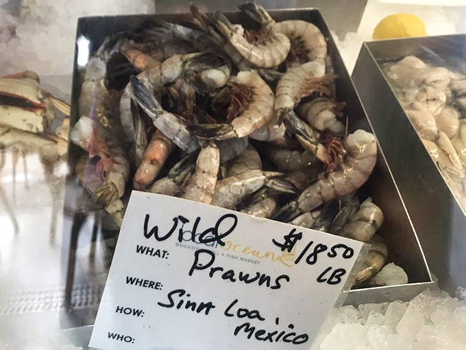 The seafood market's display tells you exactly what boat caught your dinner. Transparency that tastes as good as it feels.