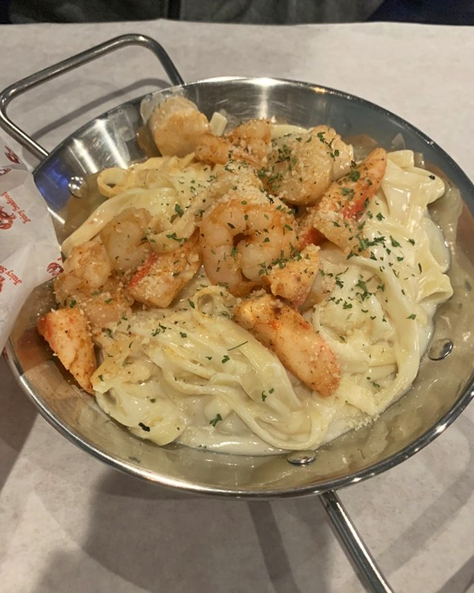 Pasta swimming with plump shrimp in a creamy sea. Carbs and seafood&mdash;a romance that never goes out of style.