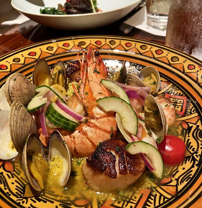 This seafood tagine on that gorgeous platter makes every other dish look underdressed for dinner.