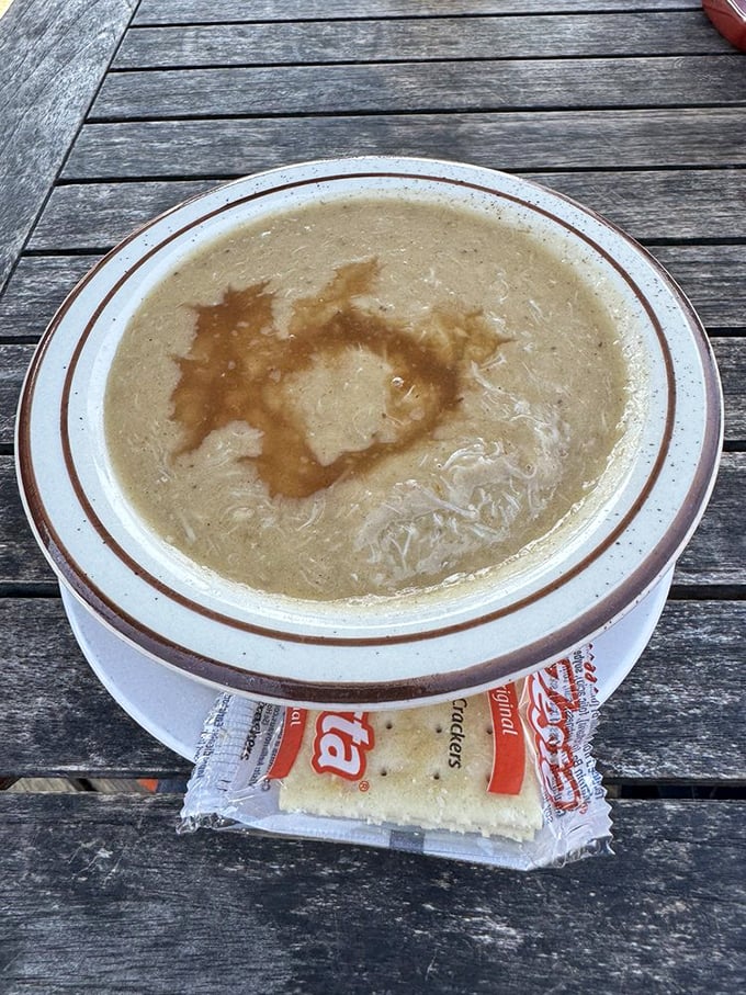 She crab soup so velvety it could moonlight as a spa treatment. That drizzle of sherry on top? Pure coastal Carolina poetry.