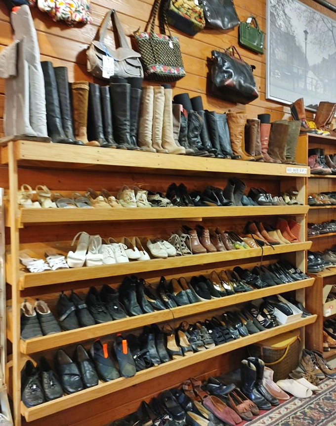The boot brigade stands at attention while flats and heels patiently wait their turn. More footwear options than my closet has seen in decades.