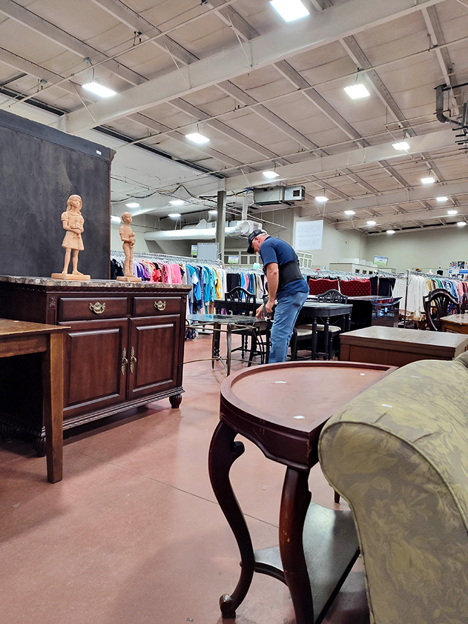 Furniture shopping becomes a thoughtful expedition as this browser contemplates whether that table would complete his living room puzzle.