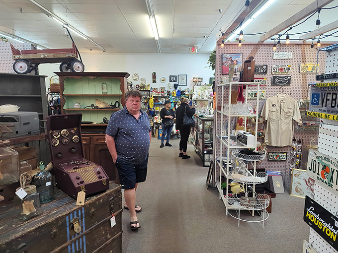 Fellow treasure hunters navigate the aisles with that unmistakable look of someone who's just spotted the perfect find.