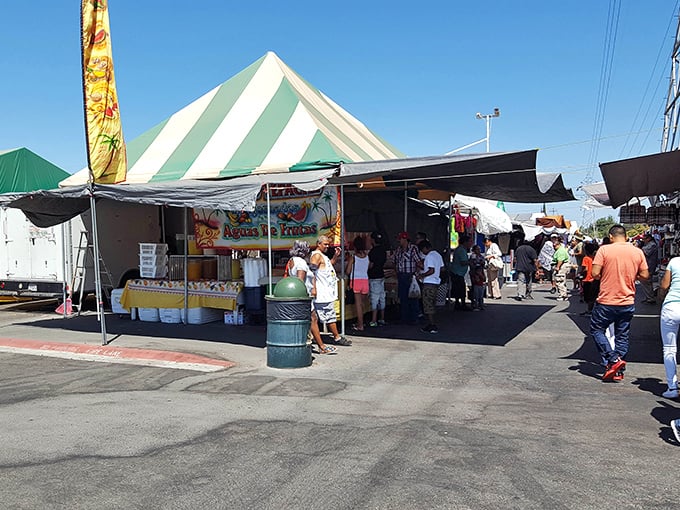 The green and white striped food pavilion becomes an oasis for hungry shoppers, where the scent of fresh-made treats fuels the next round of bargain hunting.