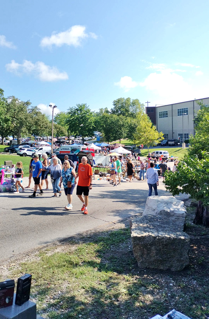 The art of the weekend wander in full display. Families and solo explorers alike navigate the market's pathways, each on their own treasure quest.