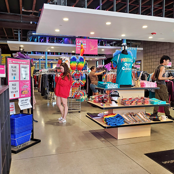 Rainbow-bright merchandise creates a festive atmosphere where shopping and community support blend seamlessly together.