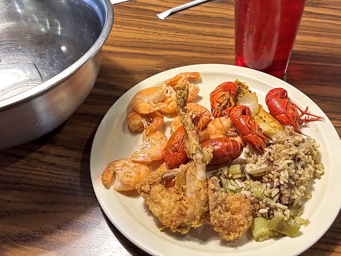 A seafood medley that would make Neptune himself nod in approval – crawfish, shrimp, and dirty rice creating the holy trinity of Cajun satisfaction.