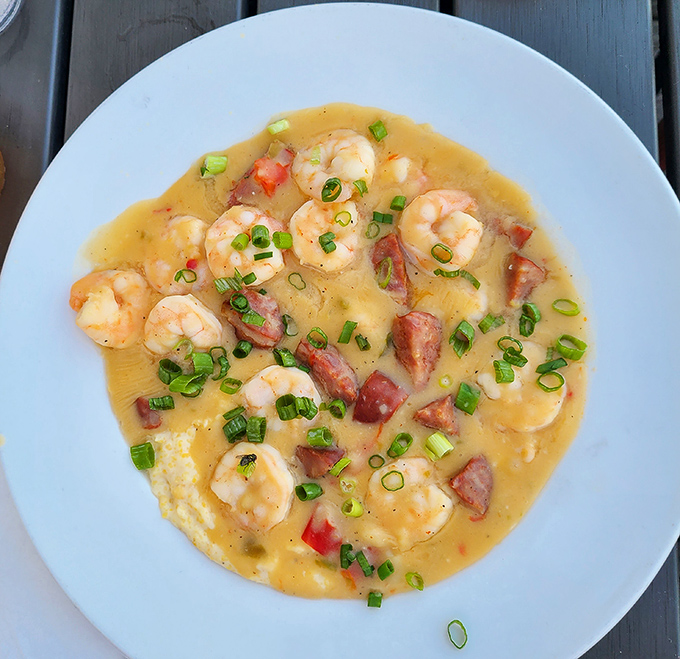 Shrimp and grits that would make a Lowcountry grandmother weep with joy&mdash;plump shrimp swimming in a savory broth with sausage and green onions.