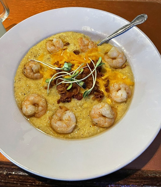 Shrimp and grits that would make Charleston jealous. Those plump Gulf shrimp circling creamy grits like delicious satellites around a cheesy planet.