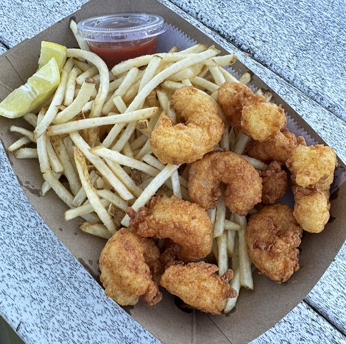 Golden-fried shrimp nestled among hand-cut fries&mdash;a basket of happiness that makes you wonder why you'd ever eat anything else.