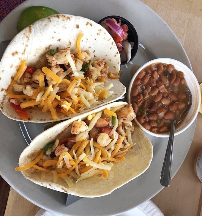 Seafood tacos done right&mdash;simple, fresh, and unencumbered by pretension. That sprinkle of cheese isn't fancy, but neither is happiness.