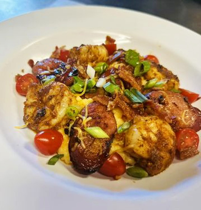 When shrimp meets grits in this colorful masterpiece, breakfast boundaries disappear and flavor takes center stage completely.