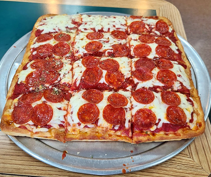 Sicilian pizza that's unapologetically square in a round world &ndash; each pepperoni placed with the precision of an Italian watchmaker.