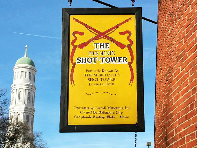 This vintage sign reveals the tower's original name&mdash;the Merchant's Shot Tower&mdash;a reminder that even landmarks sometimes get rebranding.