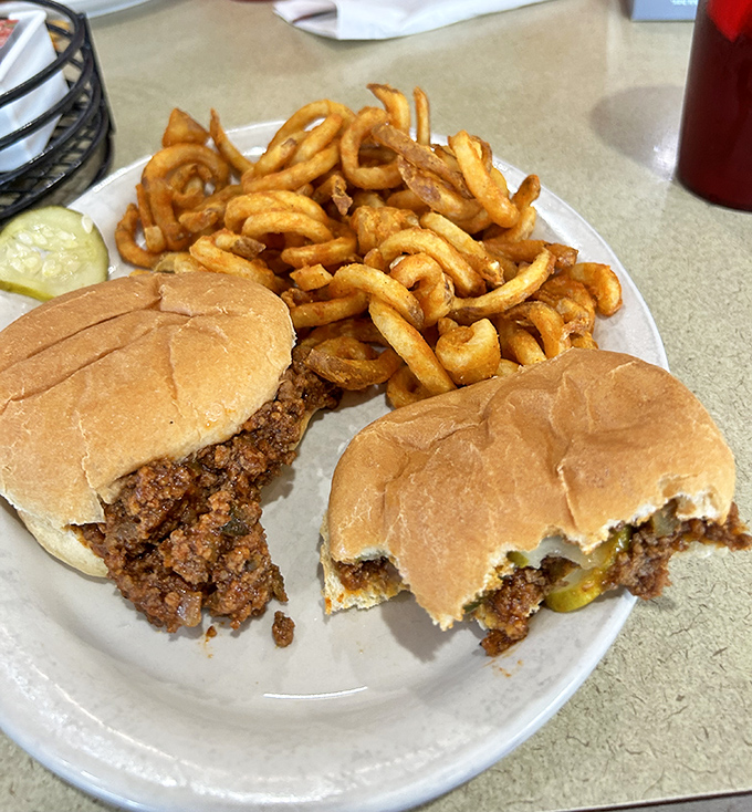 Sloppy Joes that defy their name's warning—these beautifully messy sandwiches are worth every napkin and potential shirt casualty.