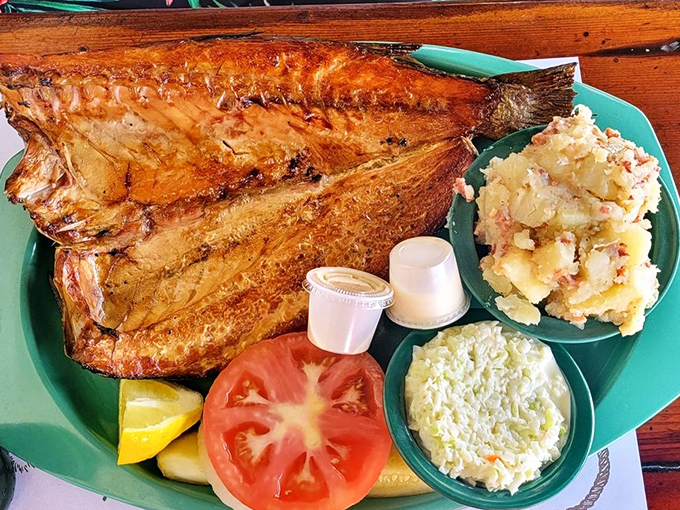 Smoked mullet so perfectly bronzed it deserves its own trophy. The fish that launched a thousand return visits.