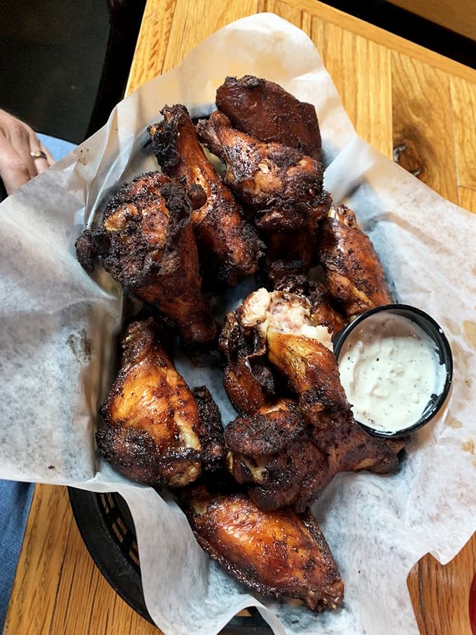 These wings aren't just smoked&mdash;they've held deep philosophical conversations with hickory wood before emerging transformed, glistening with a bark that could make trees jealous.